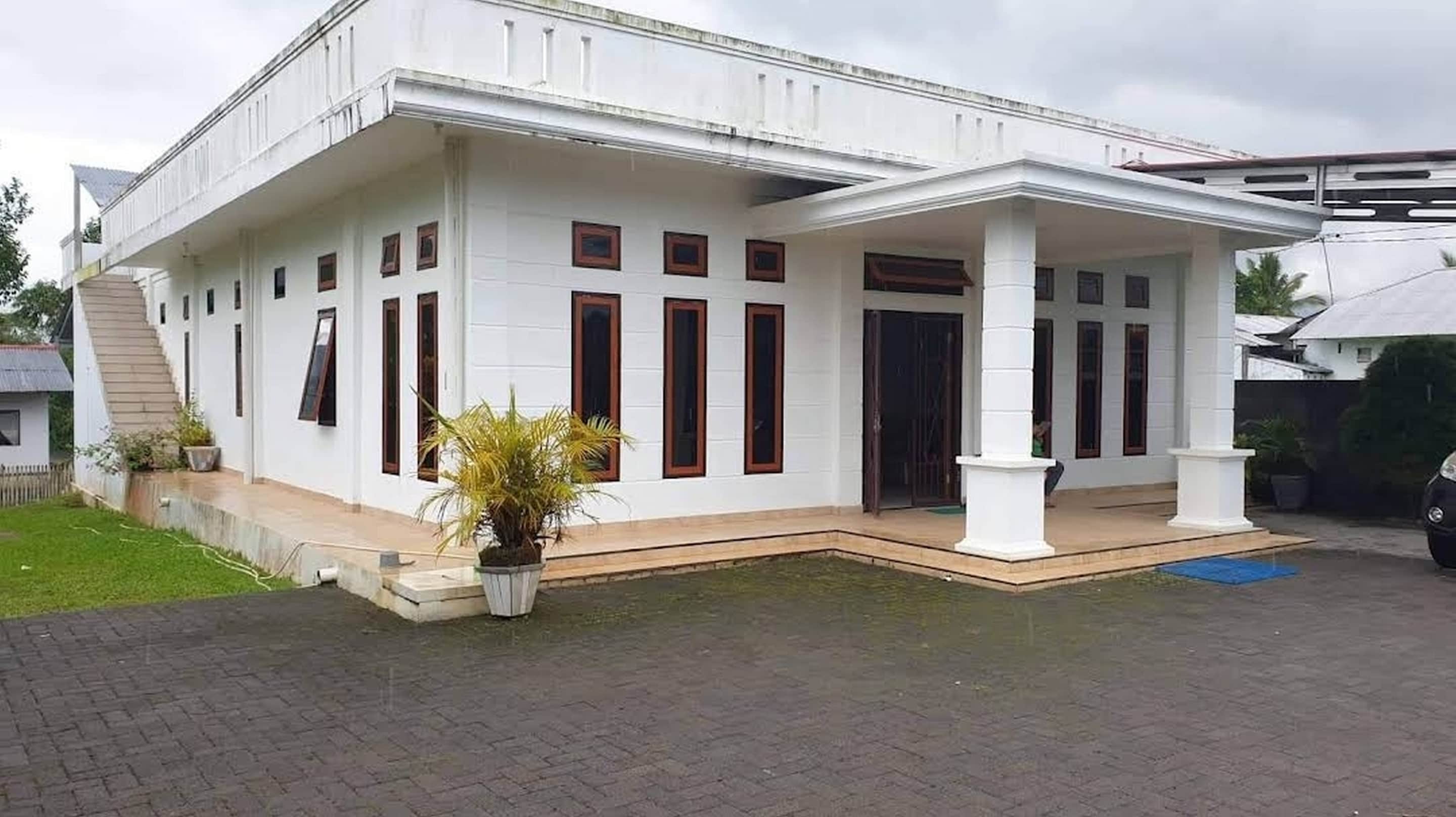 Hotel O Leheran Homestay Near CHR FARM, OYO Hotels Manado, Book ...